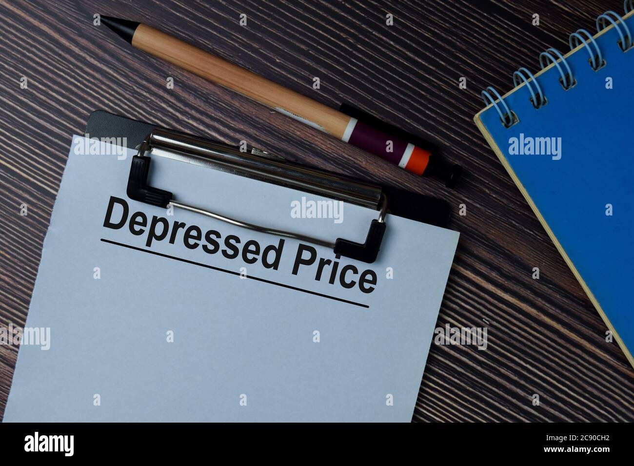 Depressed Price text write on paperwork isolated on office desk Stock ...