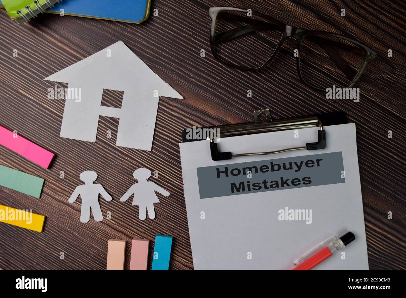Homebuyer Mistakes text write on paperwork isolated on office desk ...