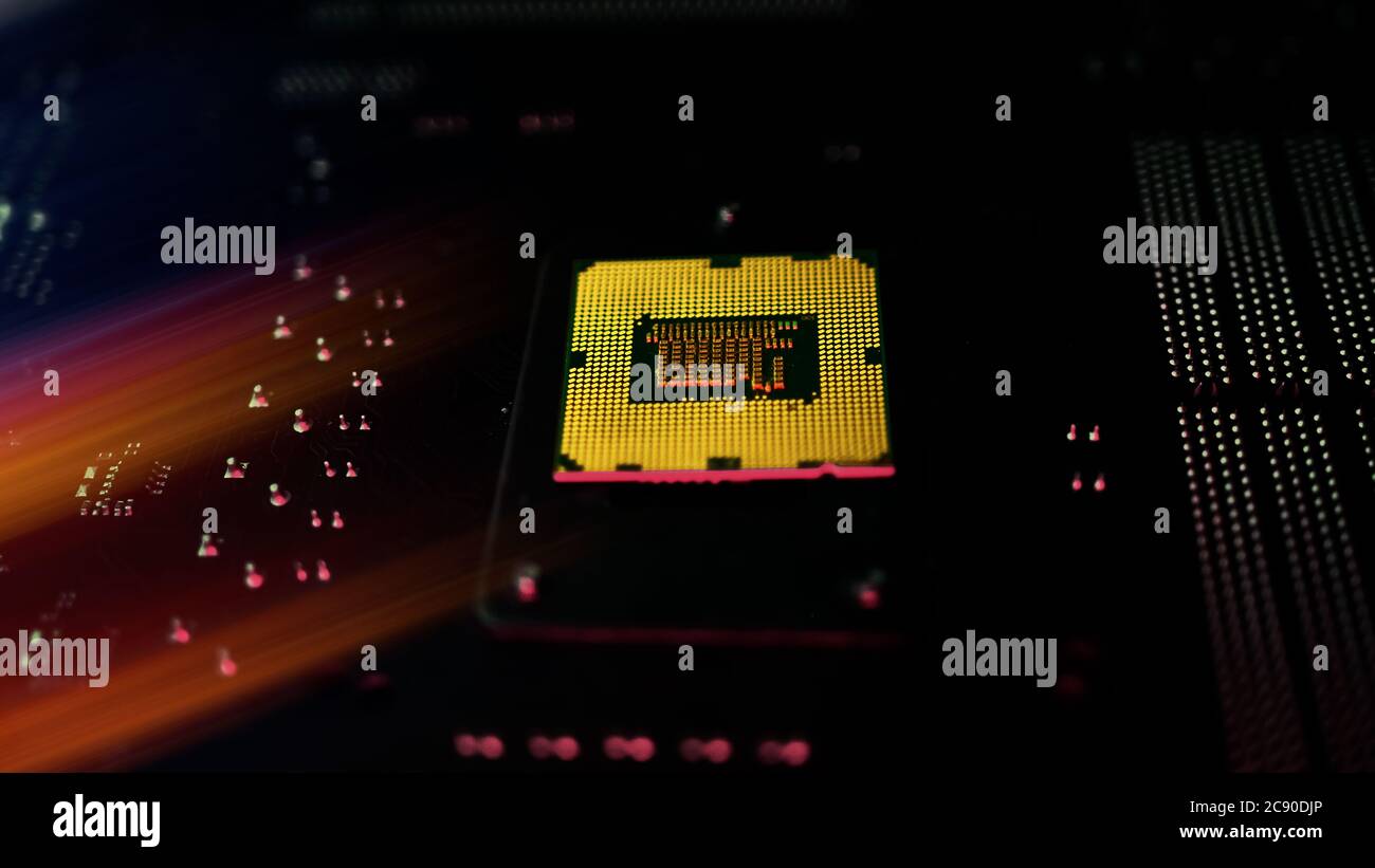 A CPU processor computer concept on motherboard in rgb lights Stock ...