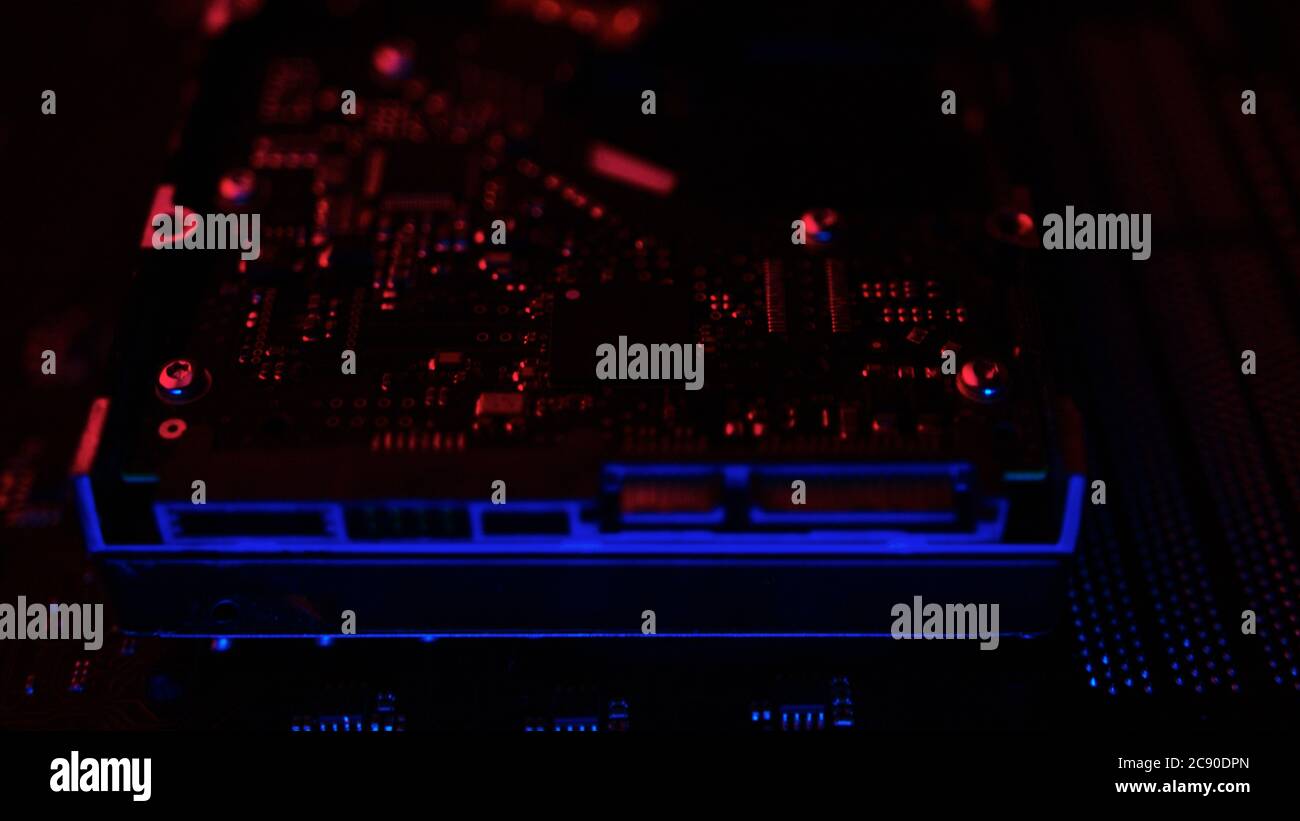 Hard disk data concept in red and blue rgb lights Stock Photo - Alamy
