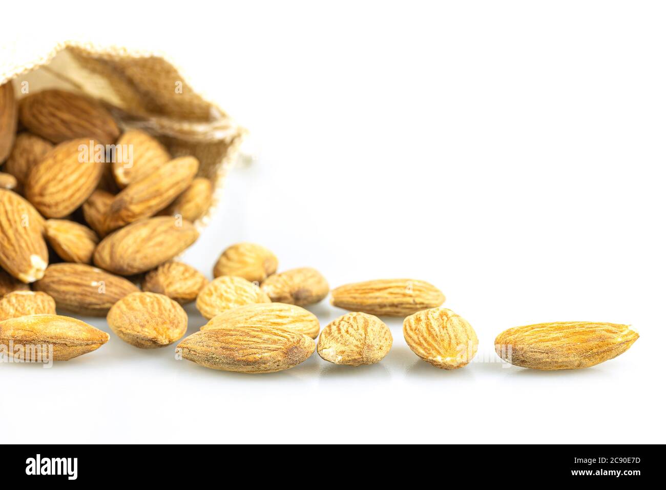 Close up of almond seeds isolate on whtite background Stock Photo - Alamy