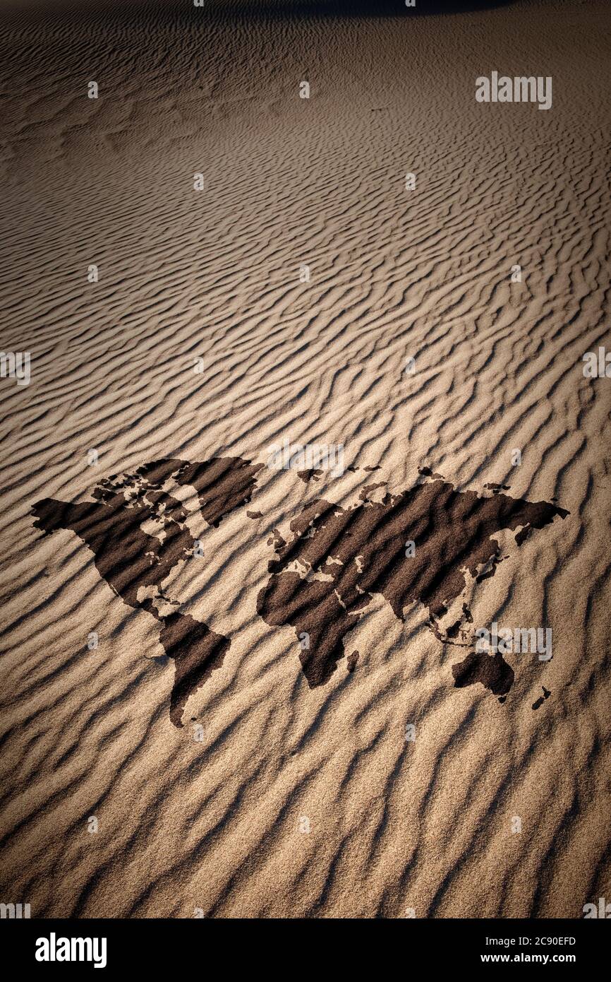 World map against desert sand Stock Photo - Alamy
