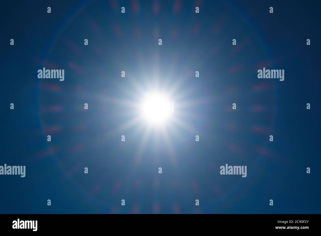 Sun in clear sky Stock Photo - Alamy
