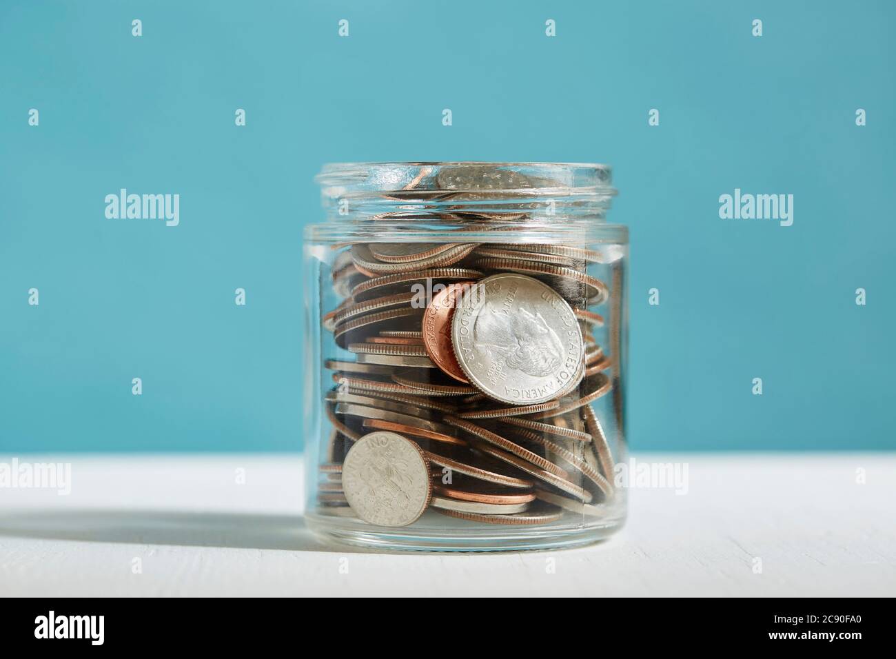 Studio shot jar full coins hi-res stock photography and images - Alamy
