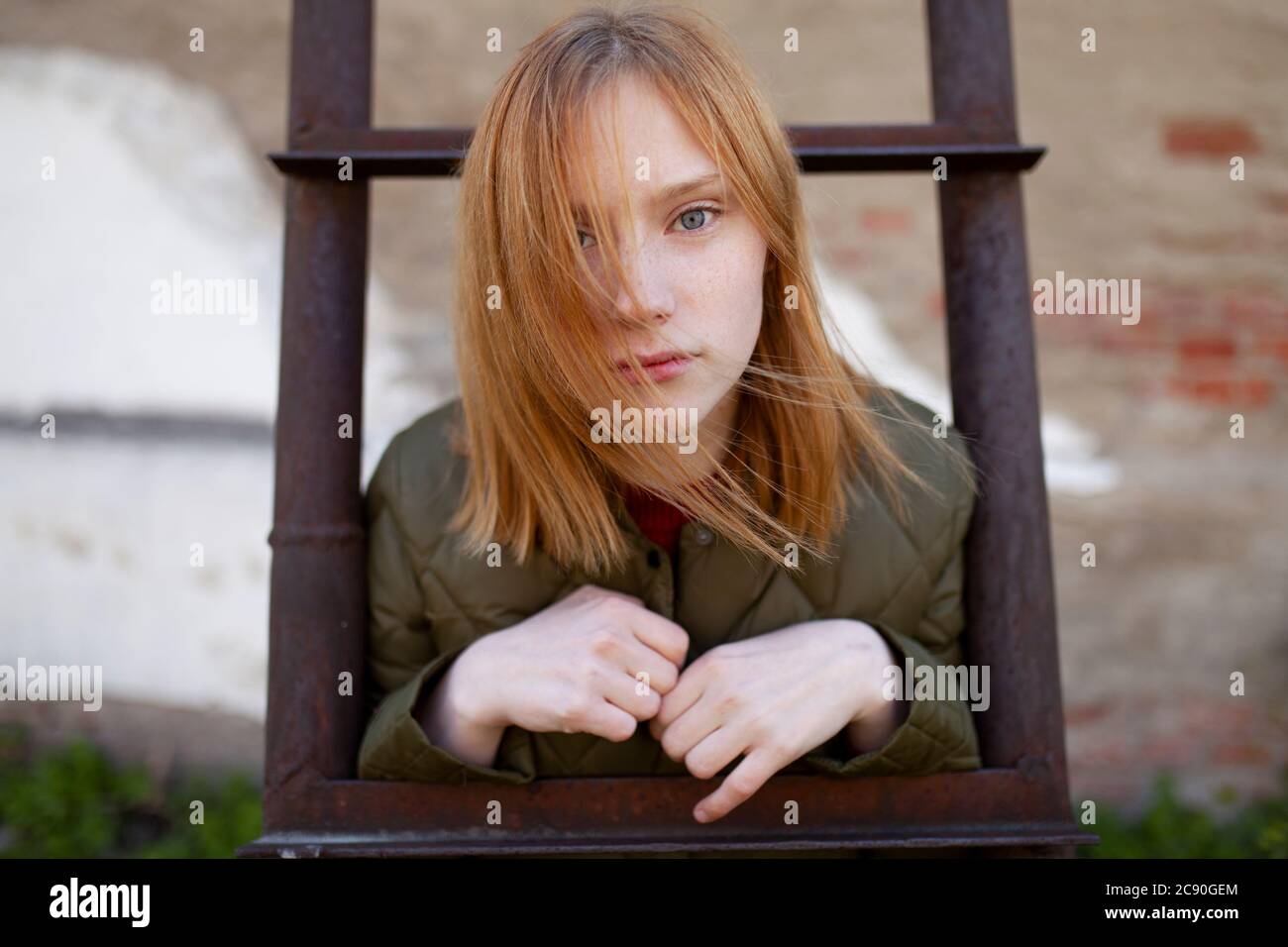 Woman on ladder hi-res stock photography and images - Alamy