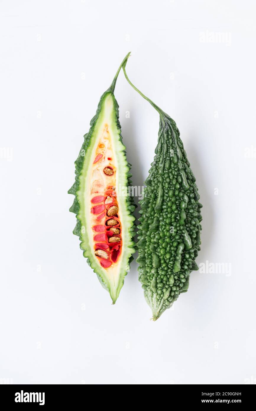 Fresh bitter melon on the white background Stock Photo - Alamy
