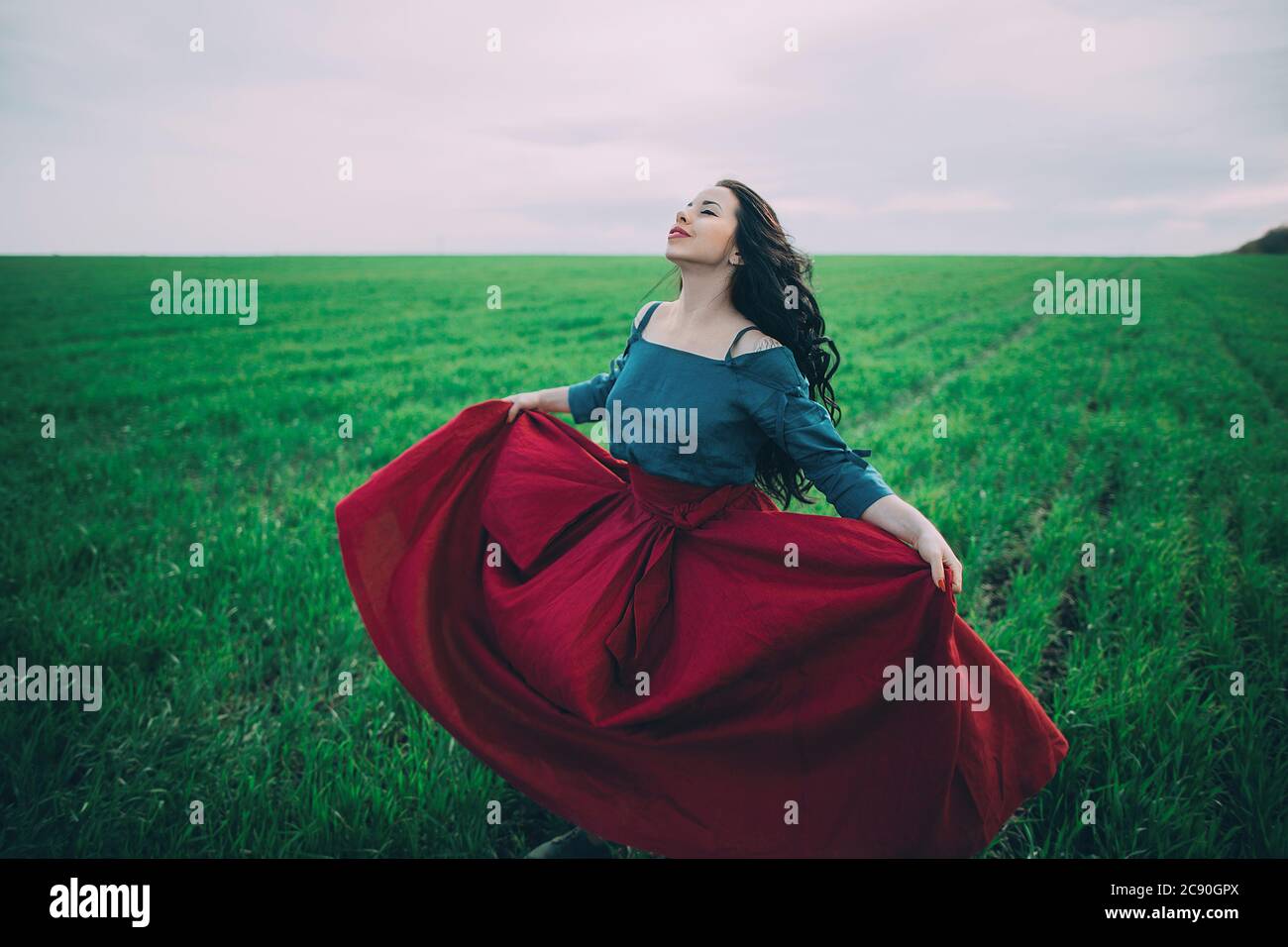 Beautiful young woman dancing over hi-res stock photography and images ...