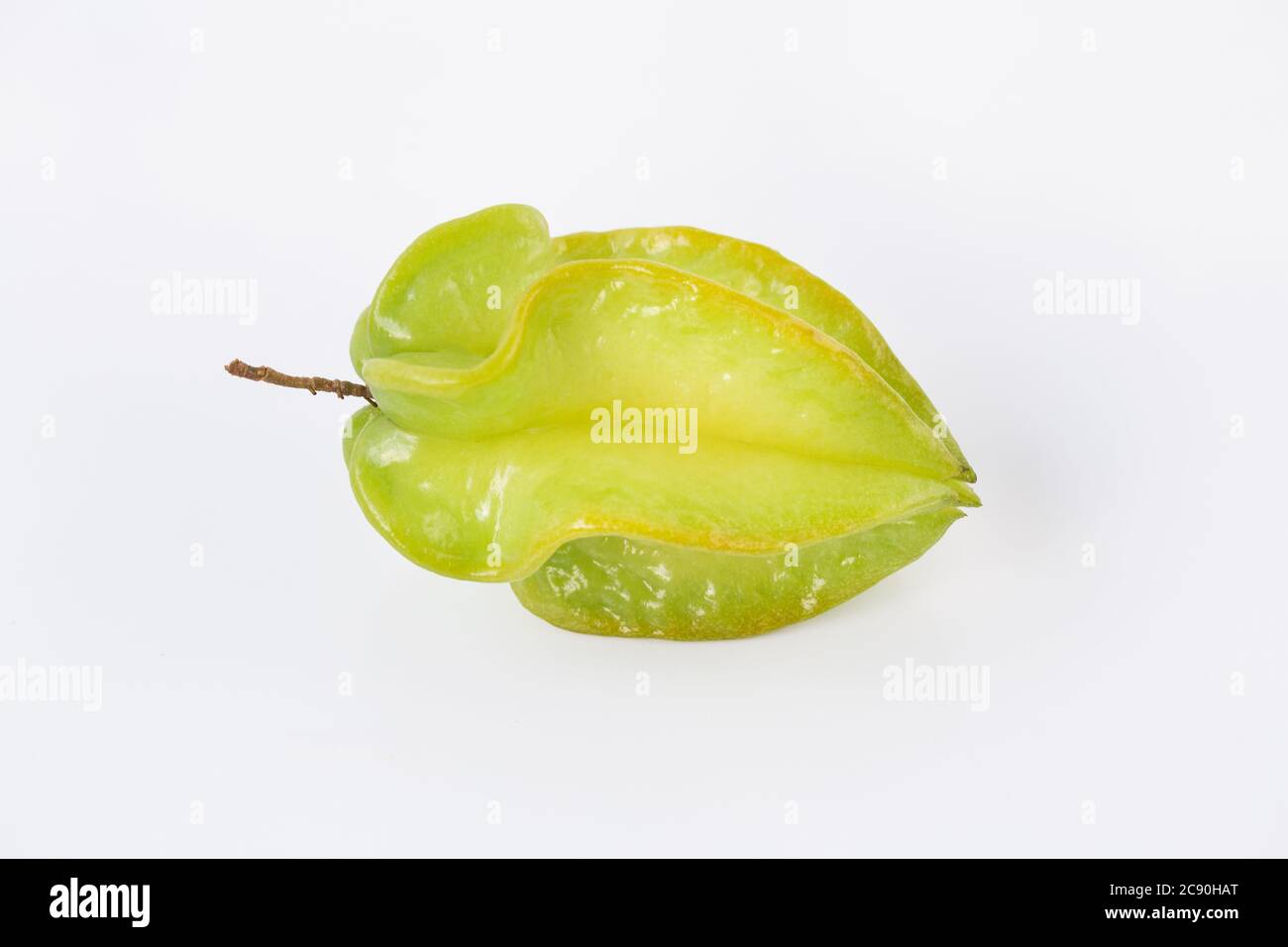 Fresh starfruit on the white background Stock Photo - Alamy