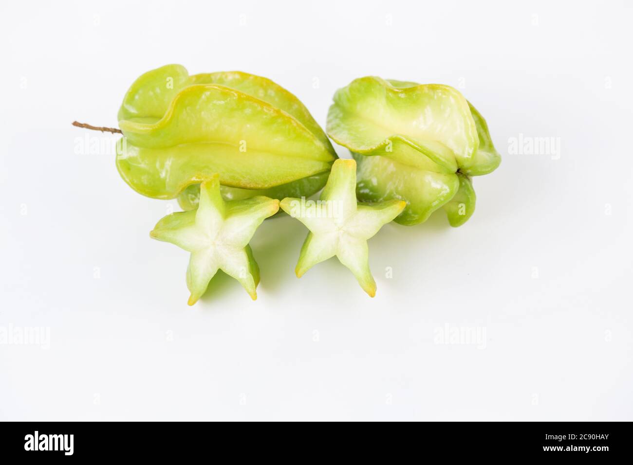 Fresh starfruit on the white background Stock Photo - Alamy