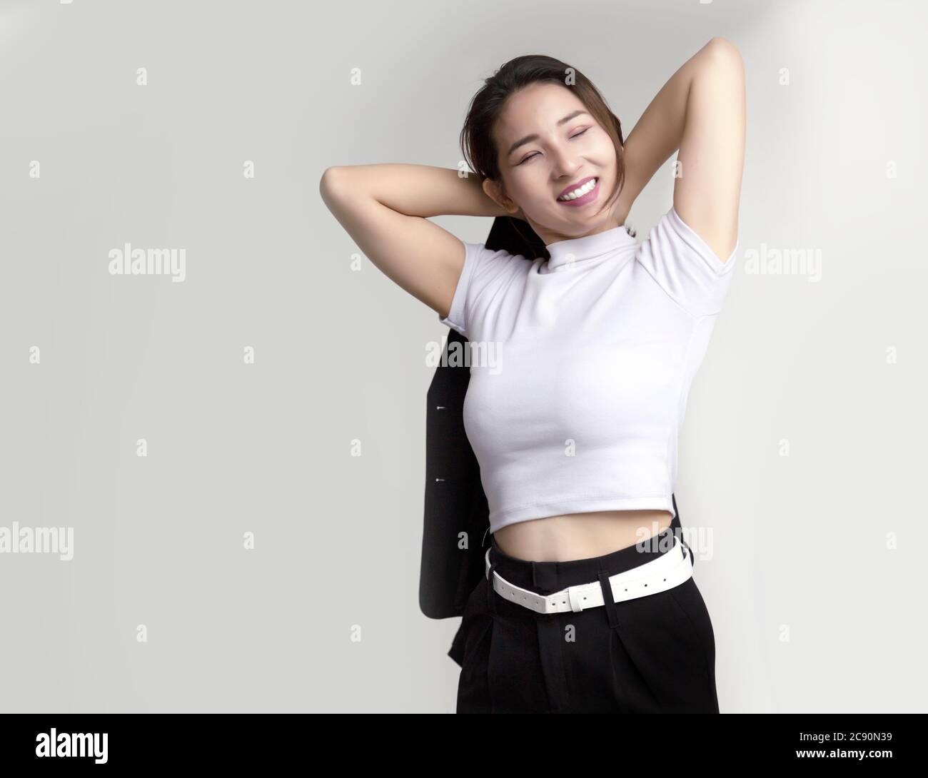 happy relax asian business woman after finish work on white isolated ...