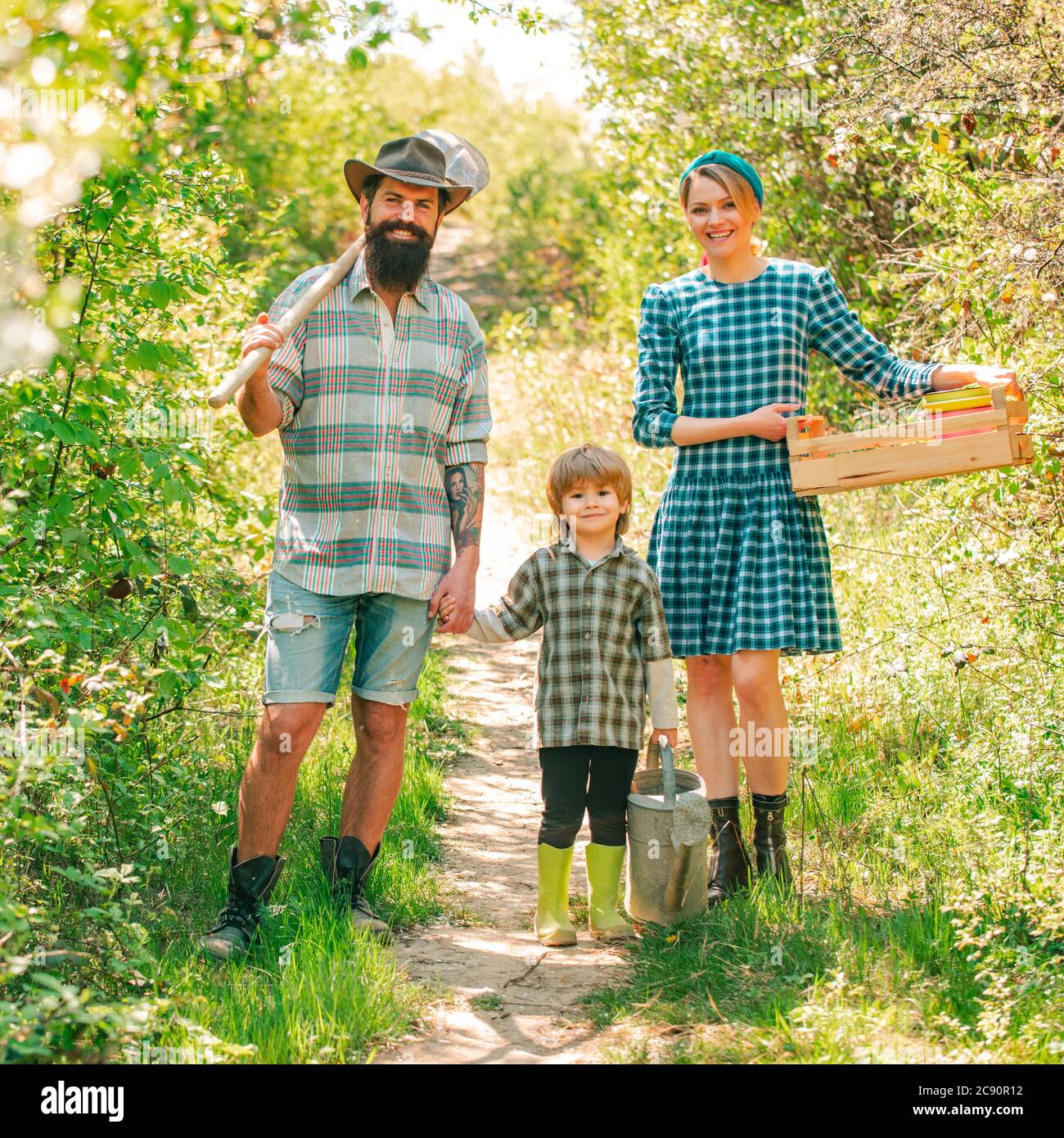 Family working together on farm. Family in the farm on countryside ...
