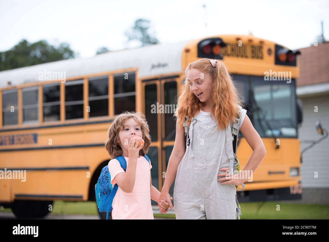 Children going school bus hi-res stock photography and images - Alamy