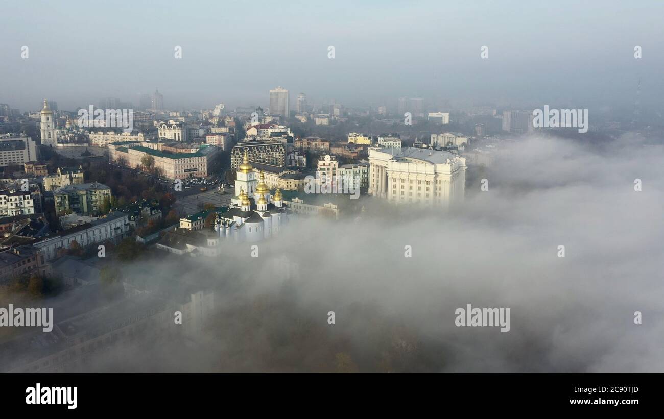 Aerial view of the city in the fog Stock Photo - Alamy