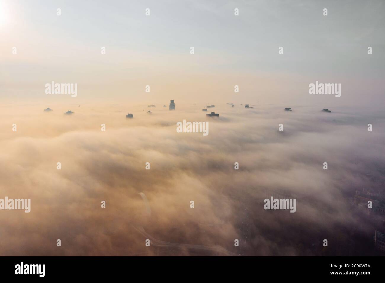 Aerial view of the city in the fog. Skyscrapers above the fog Stock ...