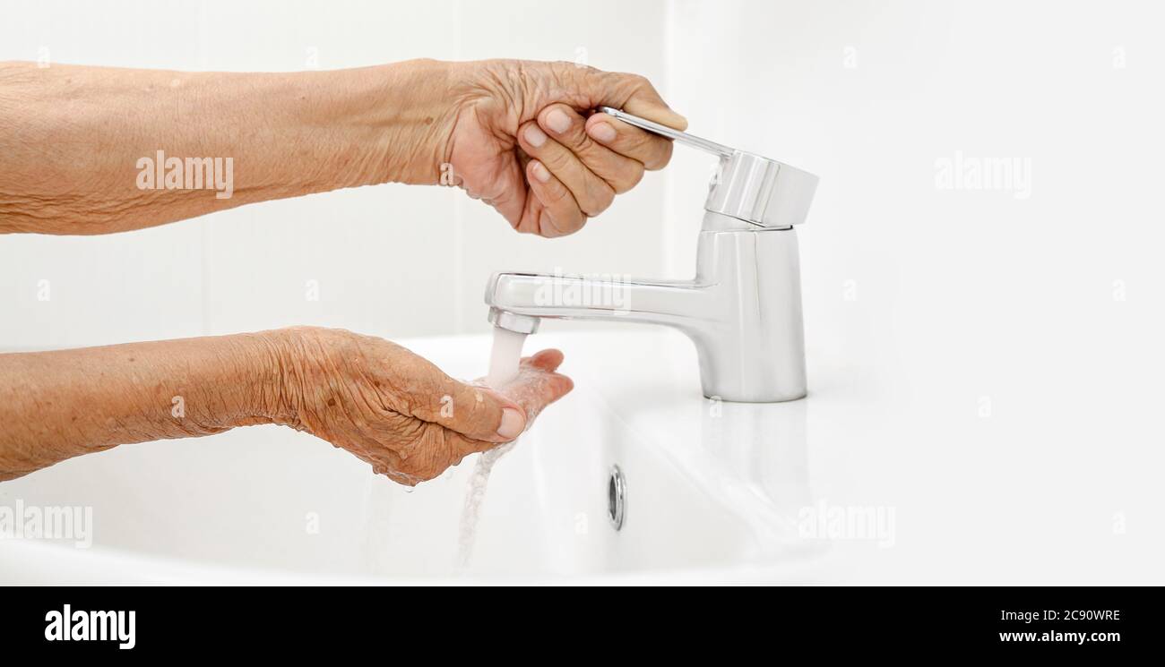 Hand washing elderly hi-res stock photography and images - Alamy