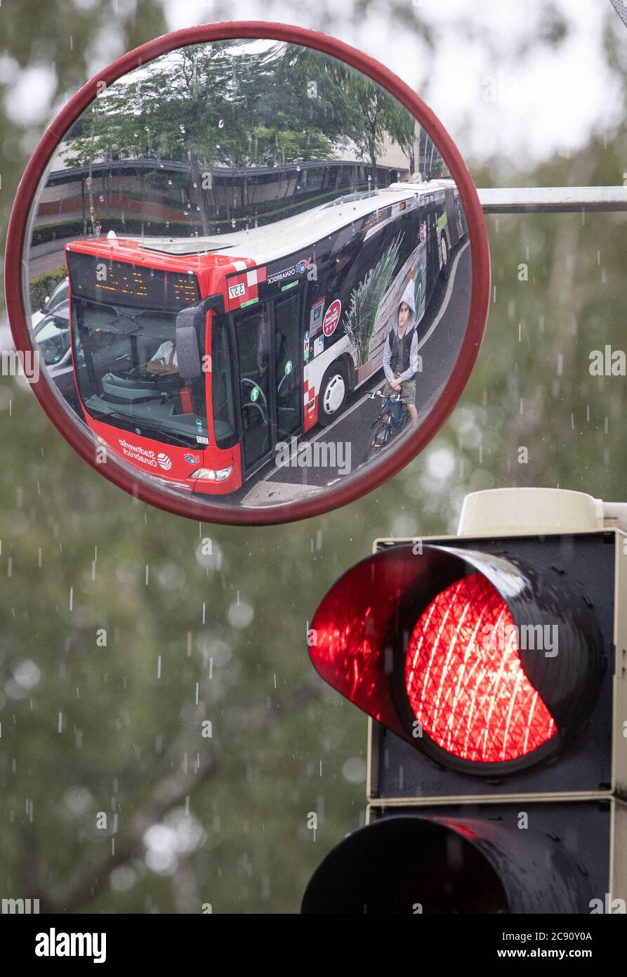 27 July 2020, Lower Saxony, Osnabrück: A round safety mirror for ...