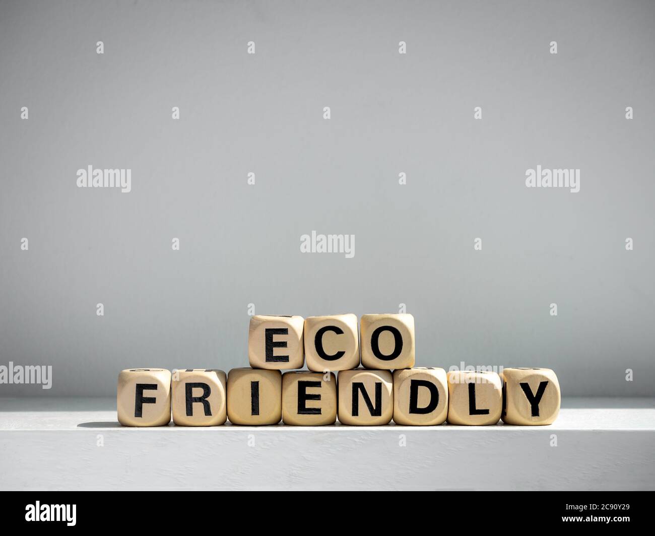 Eco friendly words on wooden cube on white background with copy space ...