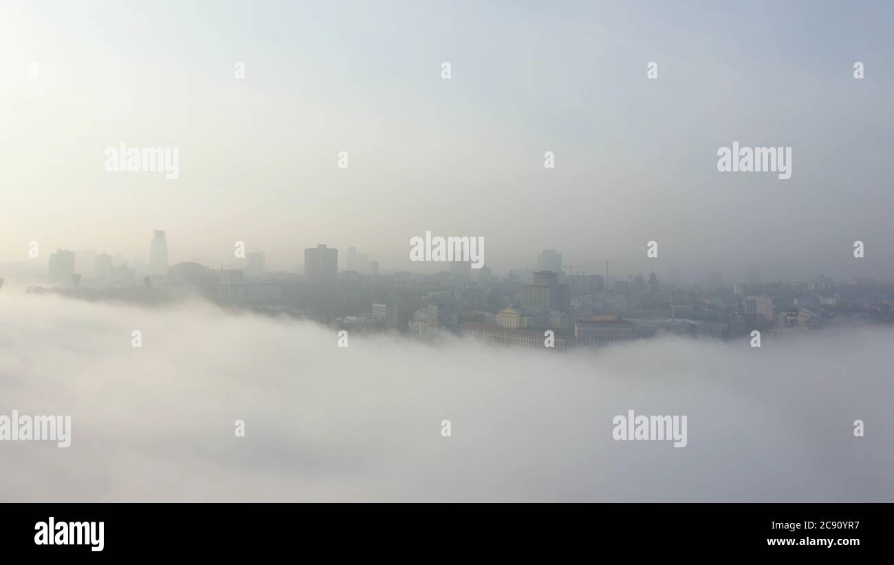 Aerial view of the city in the fog Stock Photo - Alamy