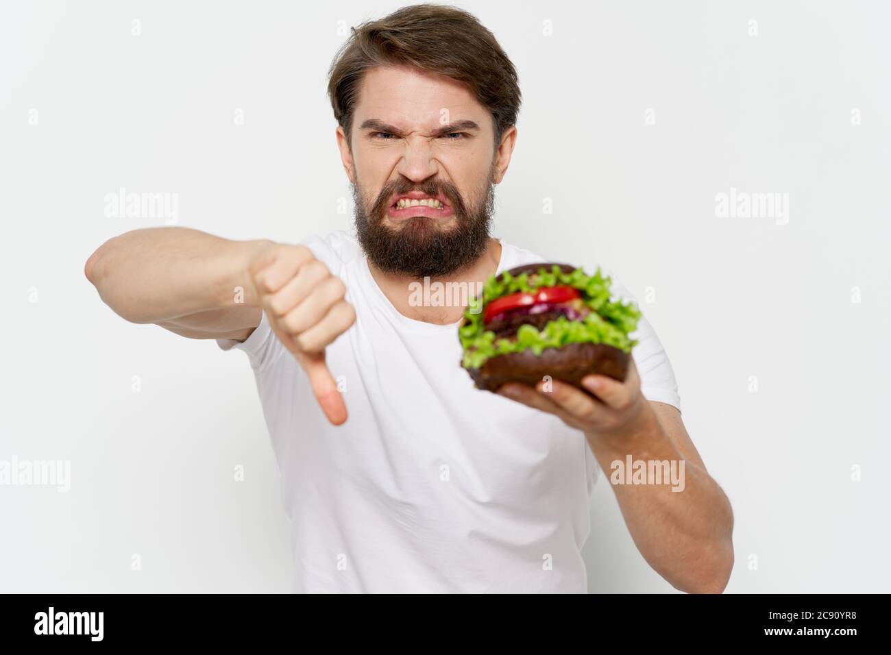 Man eating sandwich dirty hands hi-res stock photography and images - Alamy