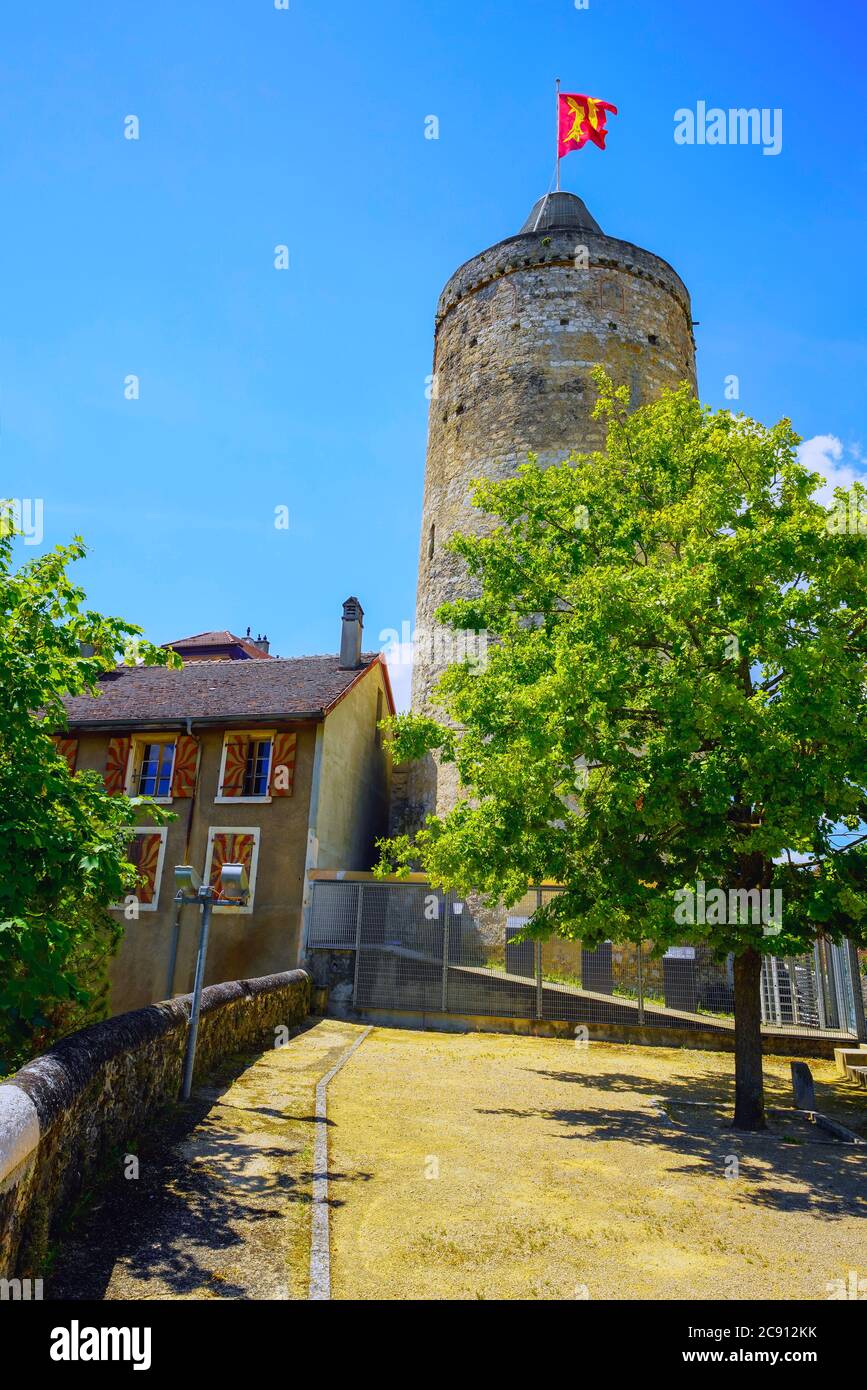 Street view of watchtower and surrounding building in Orbe village ...
