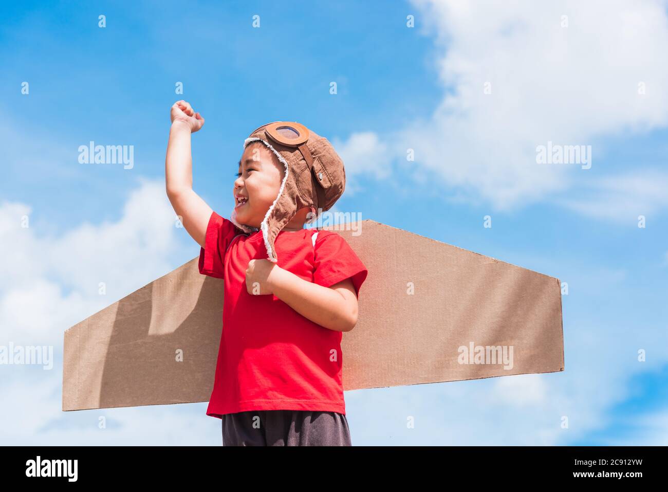 Happy Asian funny child or kid little boy smile wear pilot hat and ...