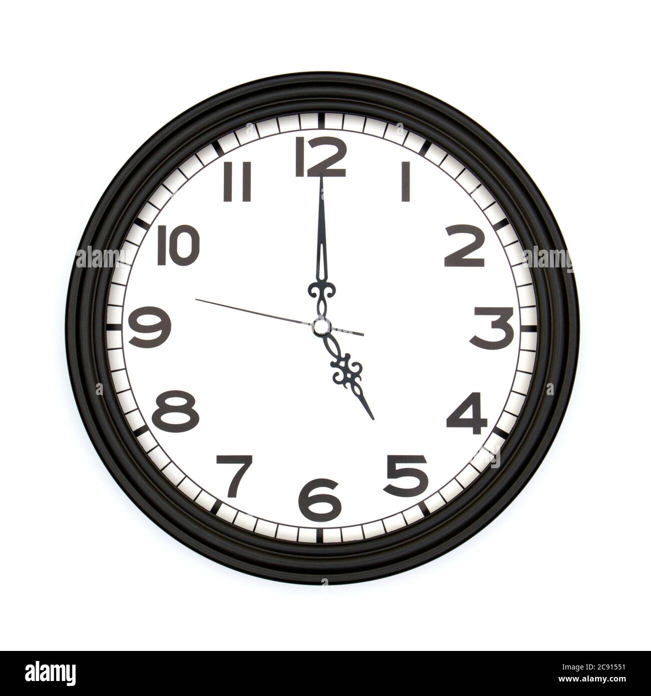 Black round analog wall clock isolated on white background, its five ...