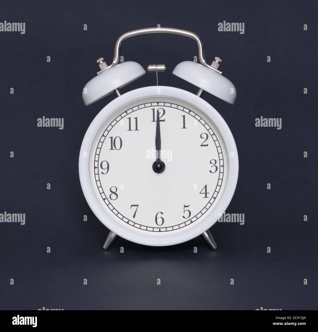 Old-style alarm clock, black and white, it's twelve oclock Stock Photo ...