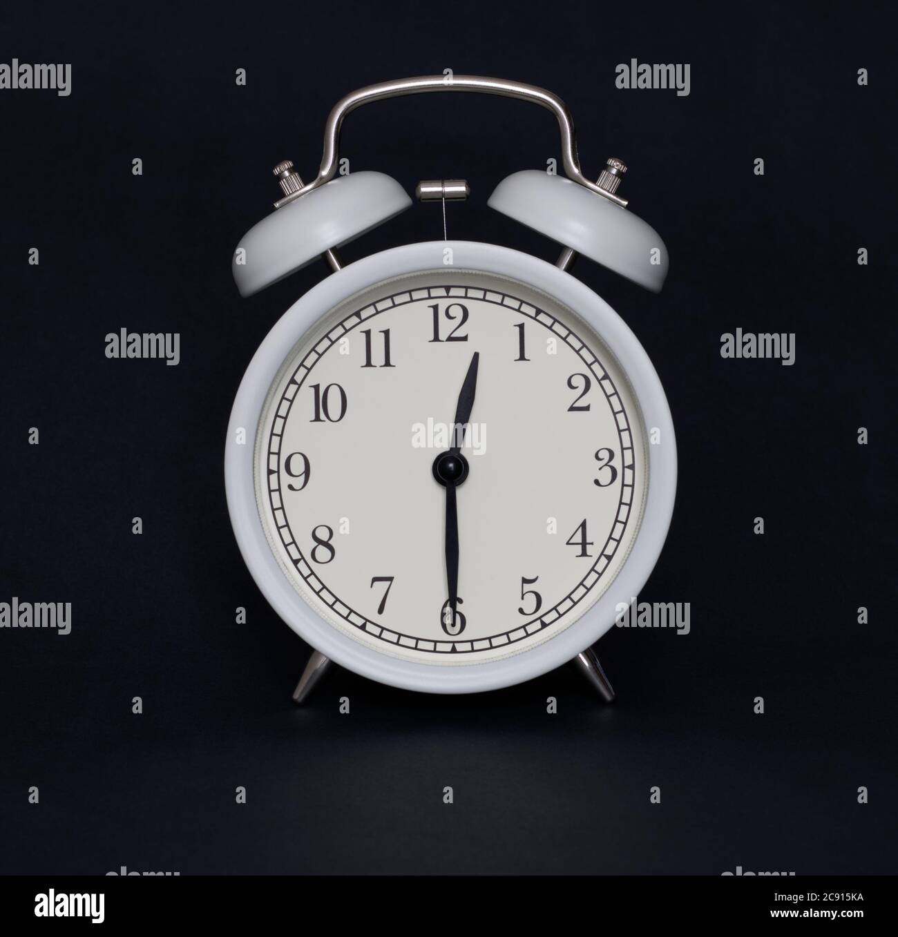 Old-style alarm clock, black and white, it's half past twelve Stock ...