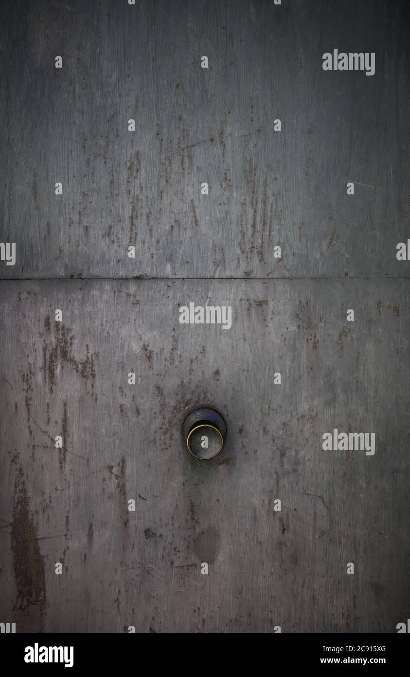 Old metal door with rusty knob, security detail on a door Stock Photo ...