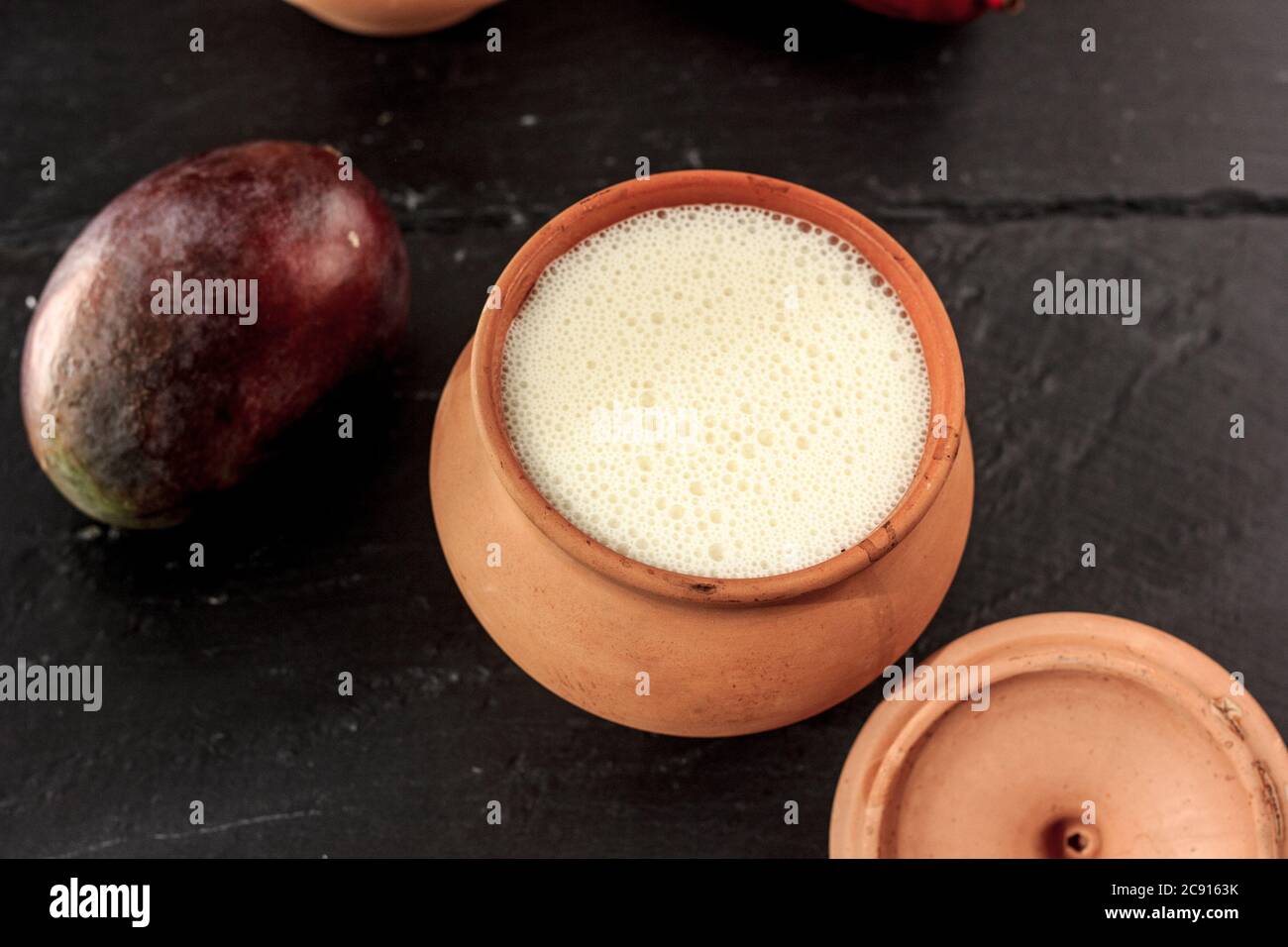 Fresh lassi in traditional indian clay pot Stock Photo - Alamy