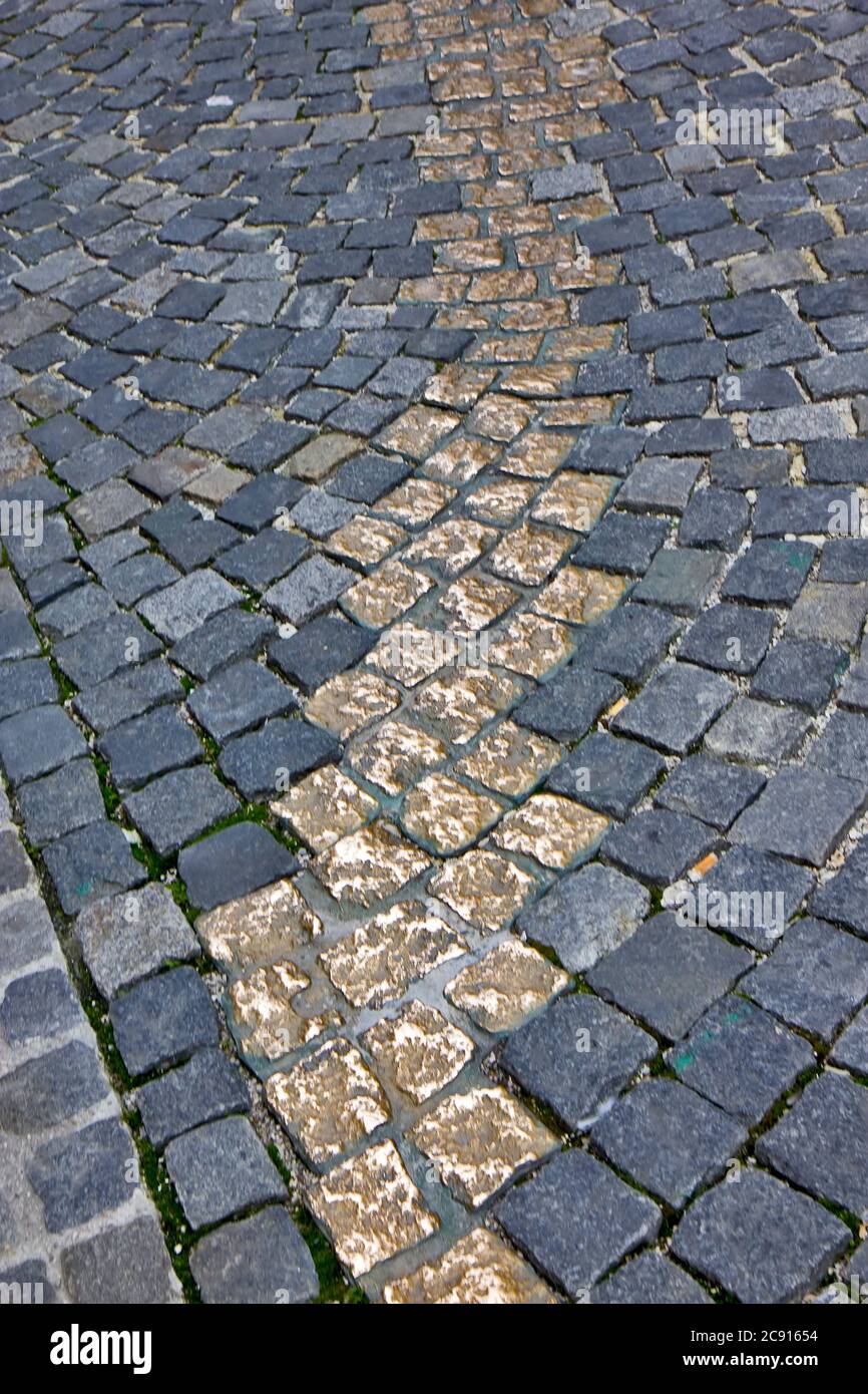 Golden cobblestones inViscardigasse street in Munich, Germany Stock ...