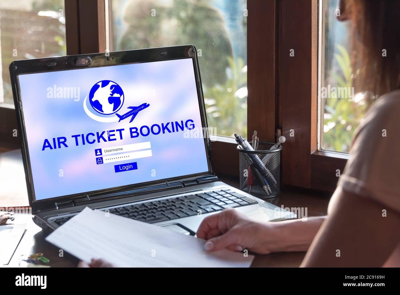 Laptop screen displaying an air ticket booking concept Stock Photo - Alamy