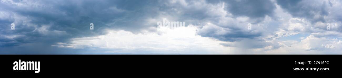Overcast sky with rain, weather conditions and forecast. Dramatic ultra ...