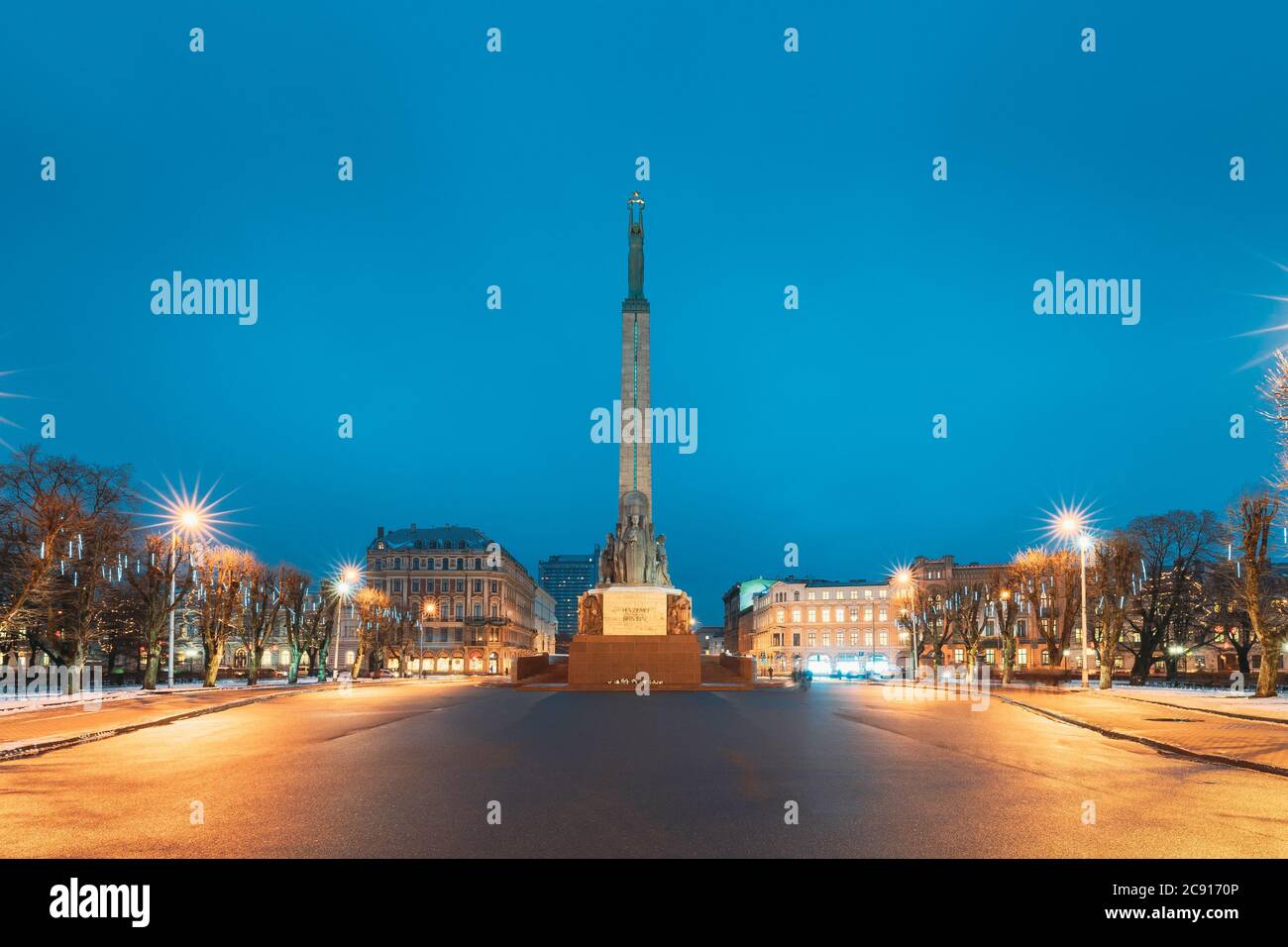 Riga, Latvia. Night View Of Memorial Freedom Monument At Freedom Square ...