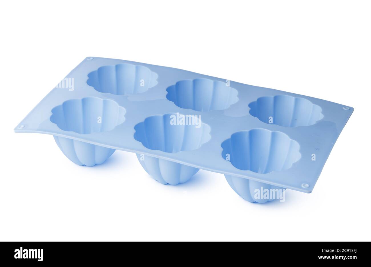 Silicone form for cupcake baking on white background Stock Photo - Alamy