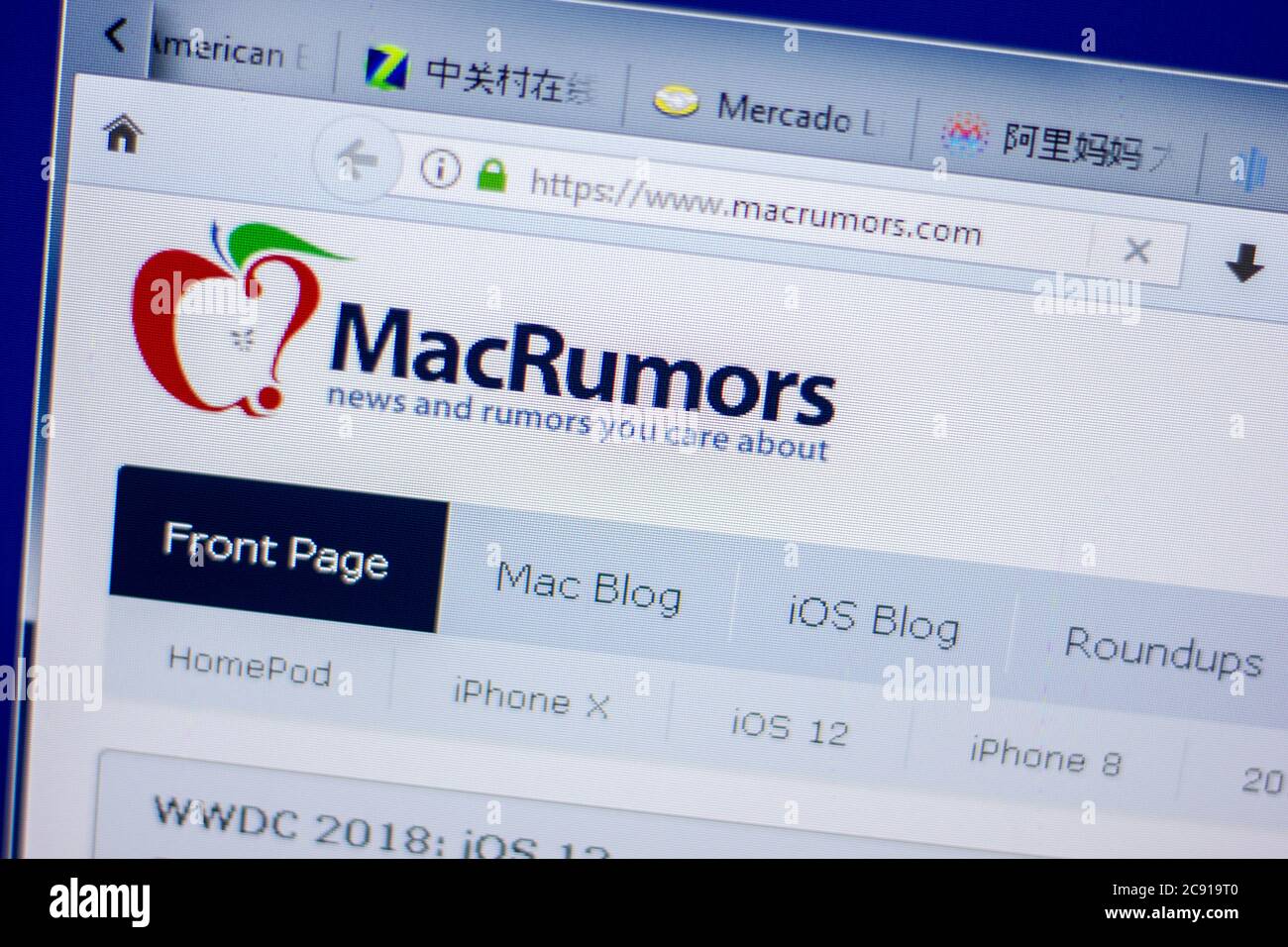 Ryazan, Russia - June 05, 2018: Homepage of MacRumors website on the display of PC, url ...