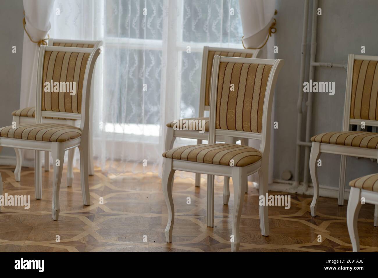 Close up of chairs in room. Beautiful seats in hall for festive events ...