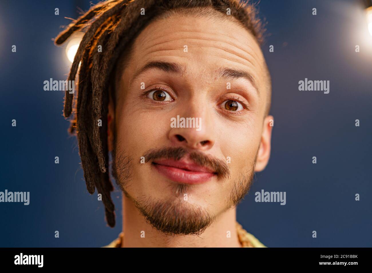 Portrait of a happy positive guy with dreadlocks Stock Photo - Alamy Portrait of a happy positive guy with dreadlocks Stock Photo - Alamy