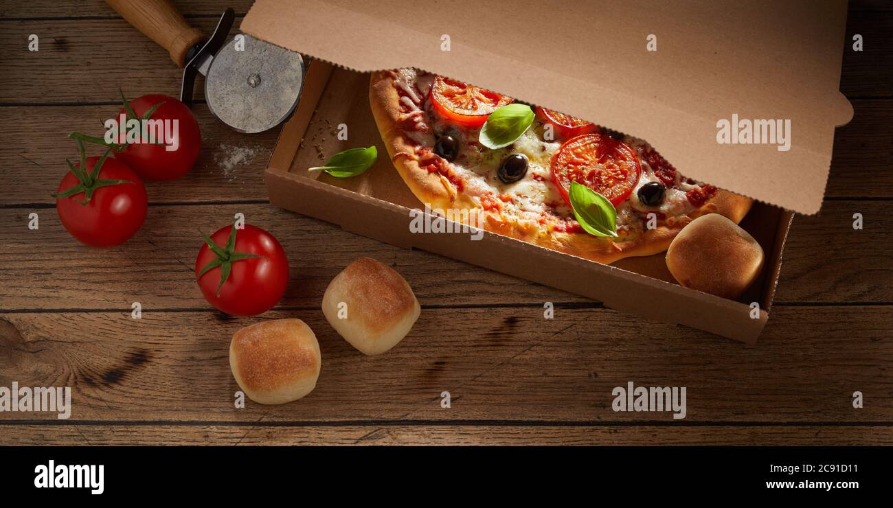 Panorama banner with freshly made Italian pizza highlighted packed ...