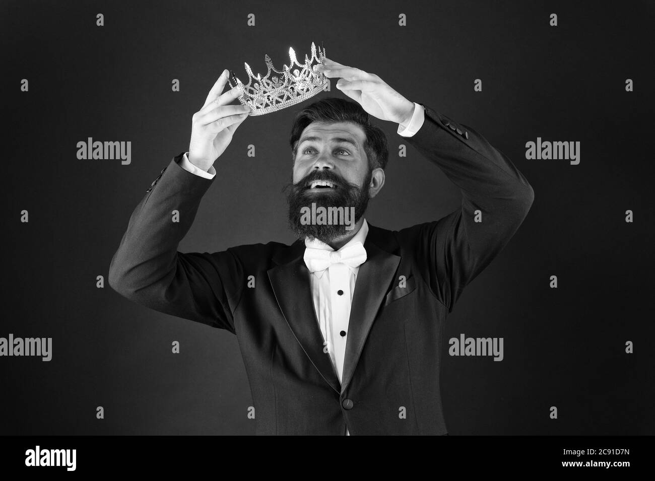Responsibility being king. Handsome bearded smiling guy king. King ...