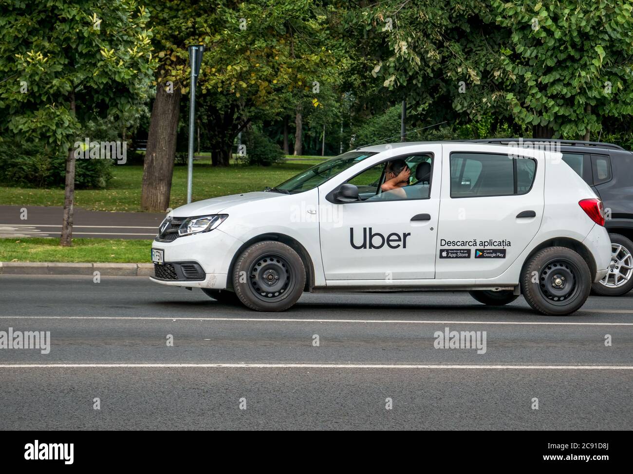 Bucharest/Romania - 07.15.2020: Car with the logo of the ride hailing ...