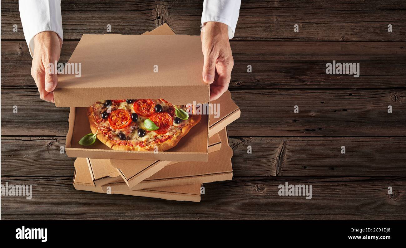 Pizza boxes table hi-res stock photography and images - Alamy