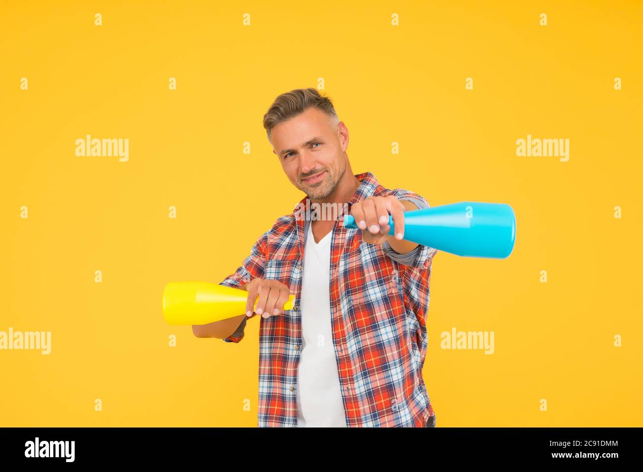 Man spraying himself hi-res stock photography and images - Alamy