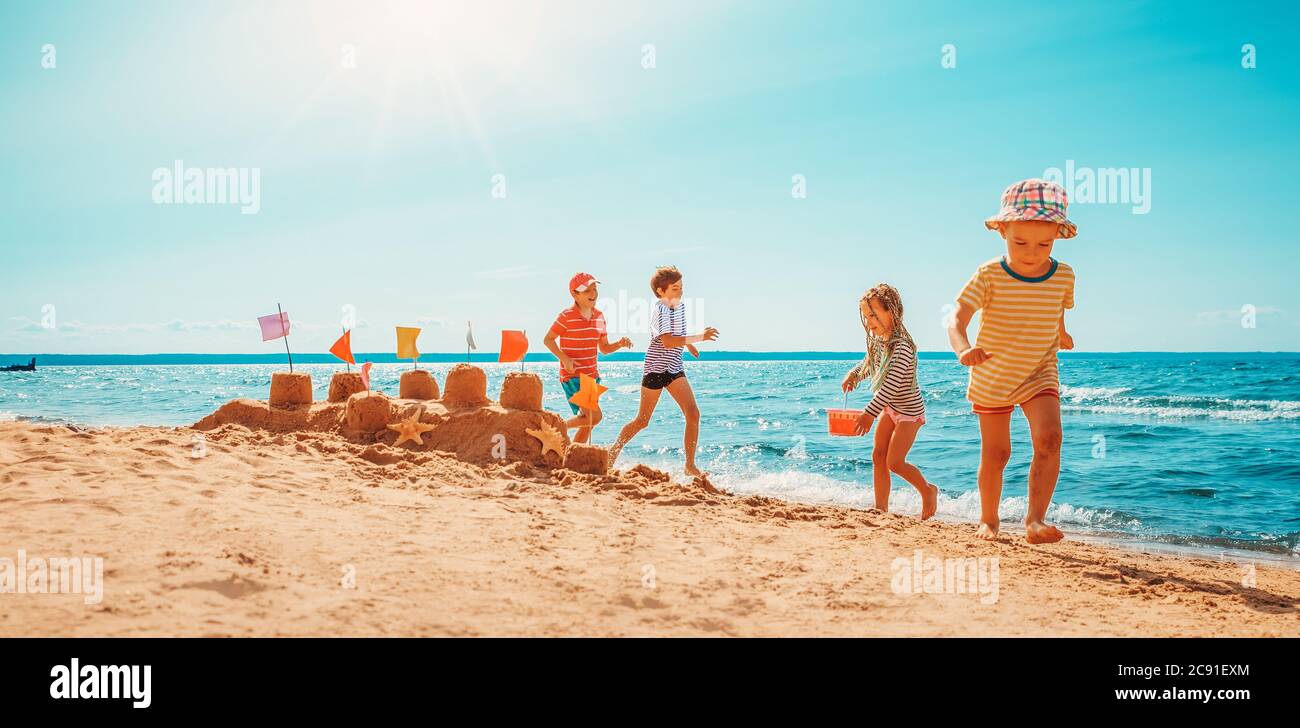 Playful children at the seaside hi-res stock photography and images - Alamy