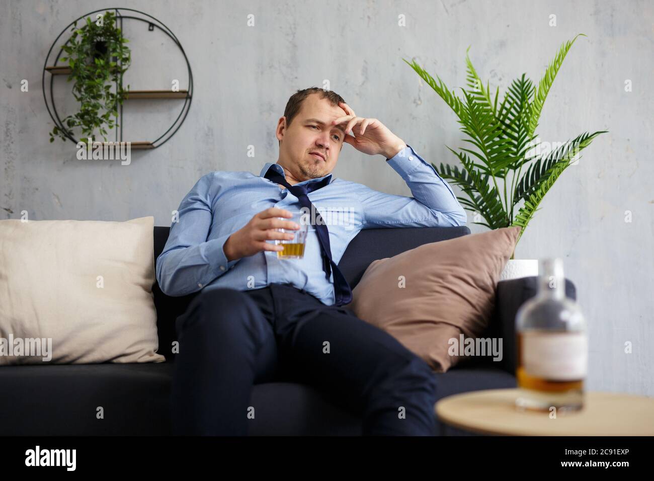 alcoholism, business and stress concept - drunk businessman drinking ...