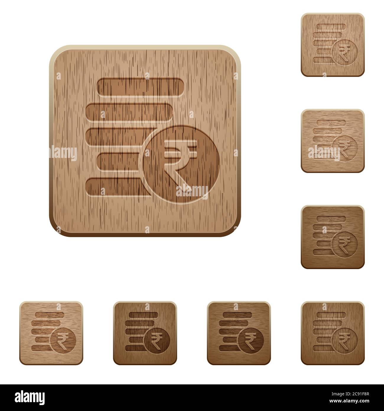 Indian Rupee coins on rounded square carved wooden button styles Stock ...