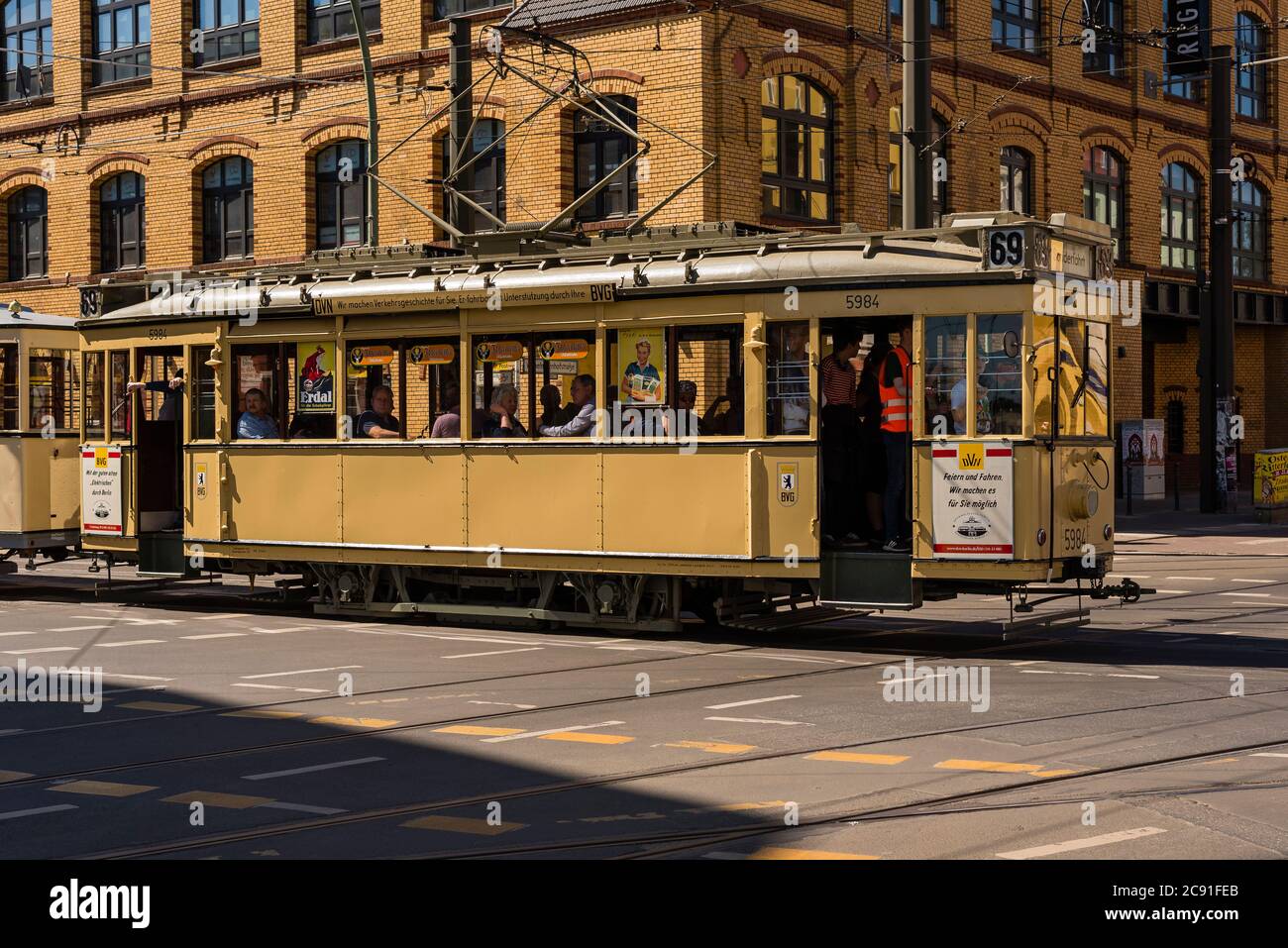 An old historical tram crossing an intersection, old tram in Berlin, Germany, old berlin tram ...