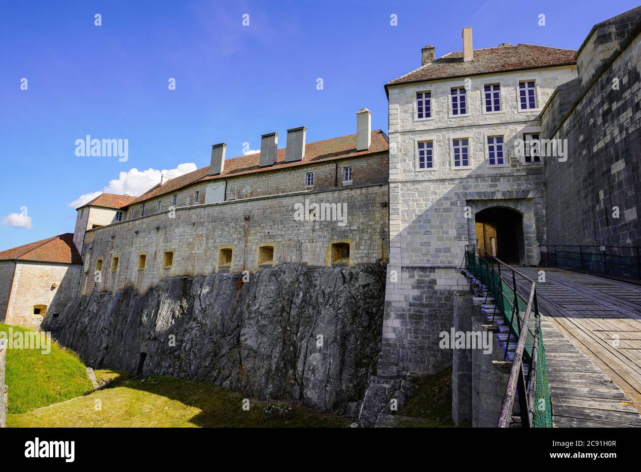 View of Chateau de Joux buildings. Chateau de Joux is located in the ...