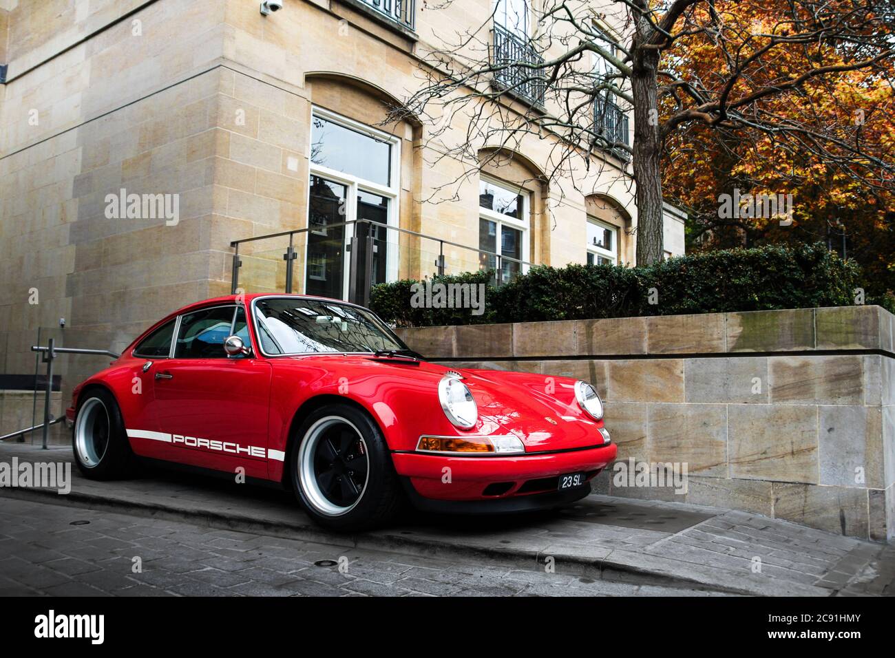 Red Singer 911 Porsche modern supercar parked at a luxury hotel in ...
