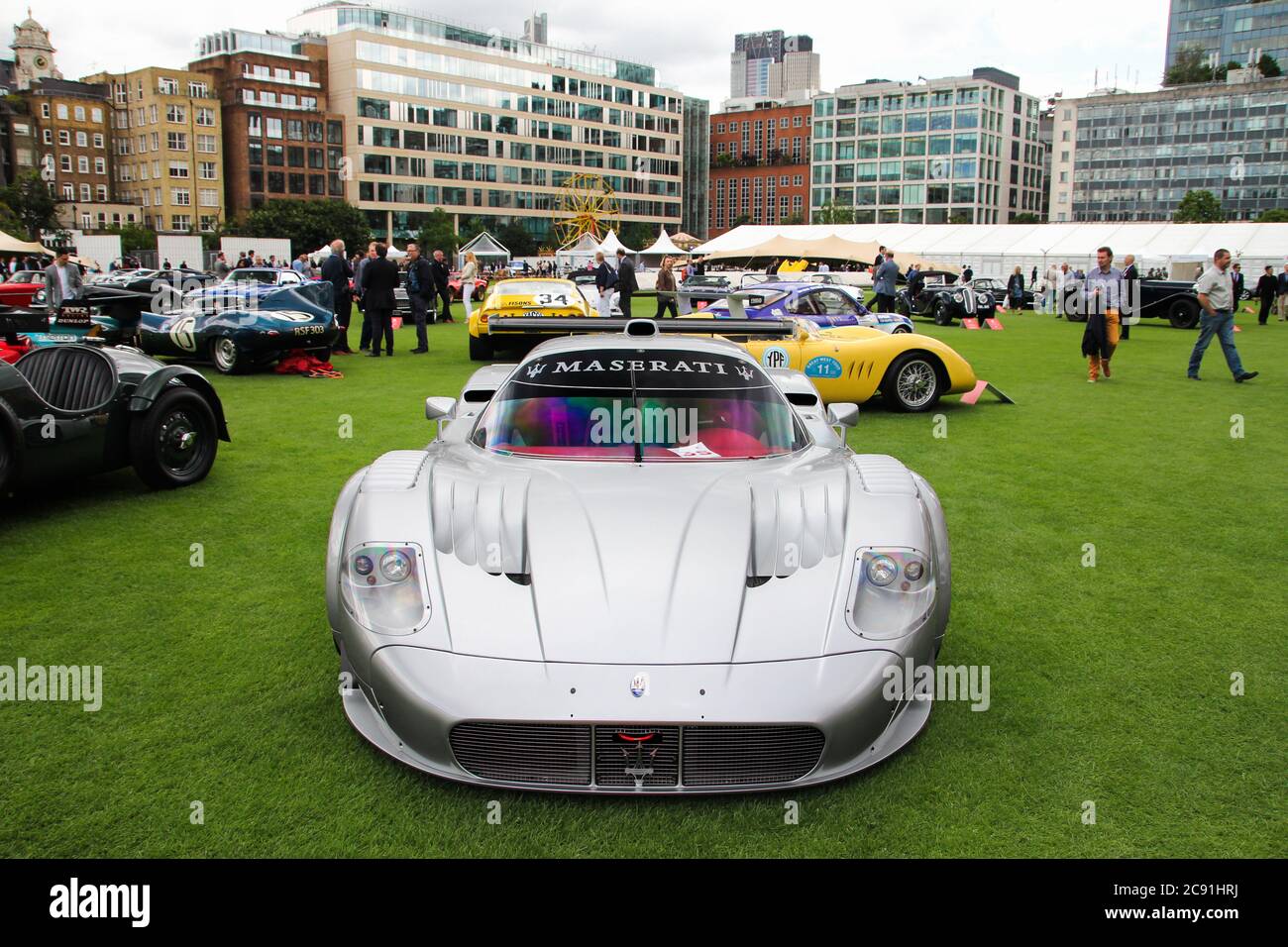 Silver Maserati MC12 Versione Corsa classic track supercar attending ...